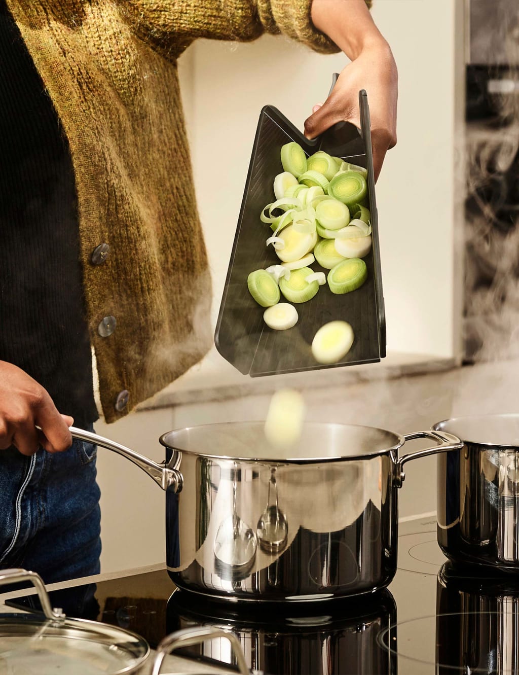 Chop2Pot™ Plus Chopping Board | Joseph Joseph | M&S