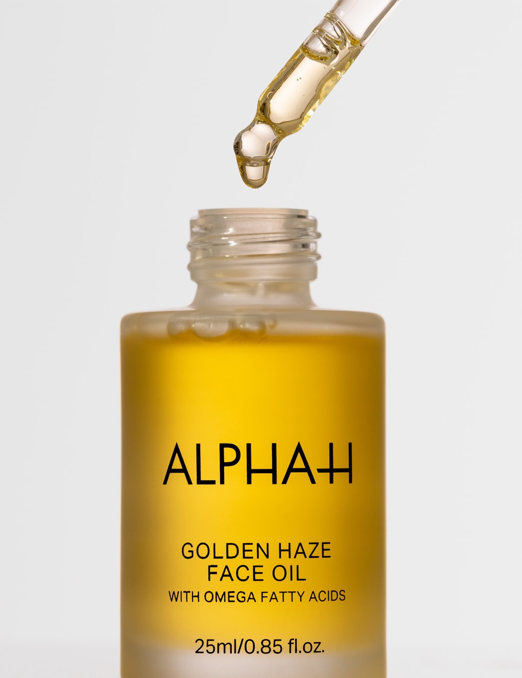 Golden Haze Face Oil with Omega Fatty Acids 25ml | Alpha-H | M&S